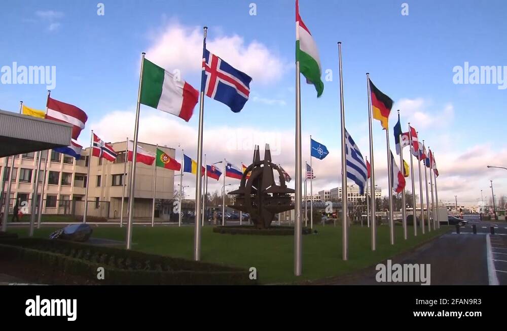 Flags of various countries wave outside at NATO Headquarters building ...