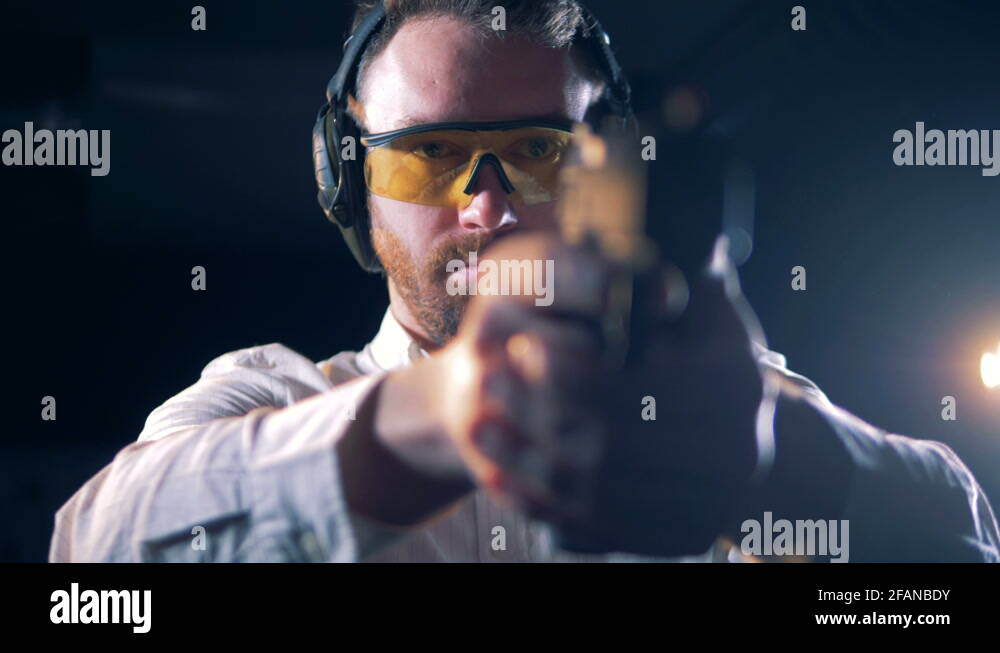 Rear view man holding gun Stock Videos & Footage - HD and 4K Video ...