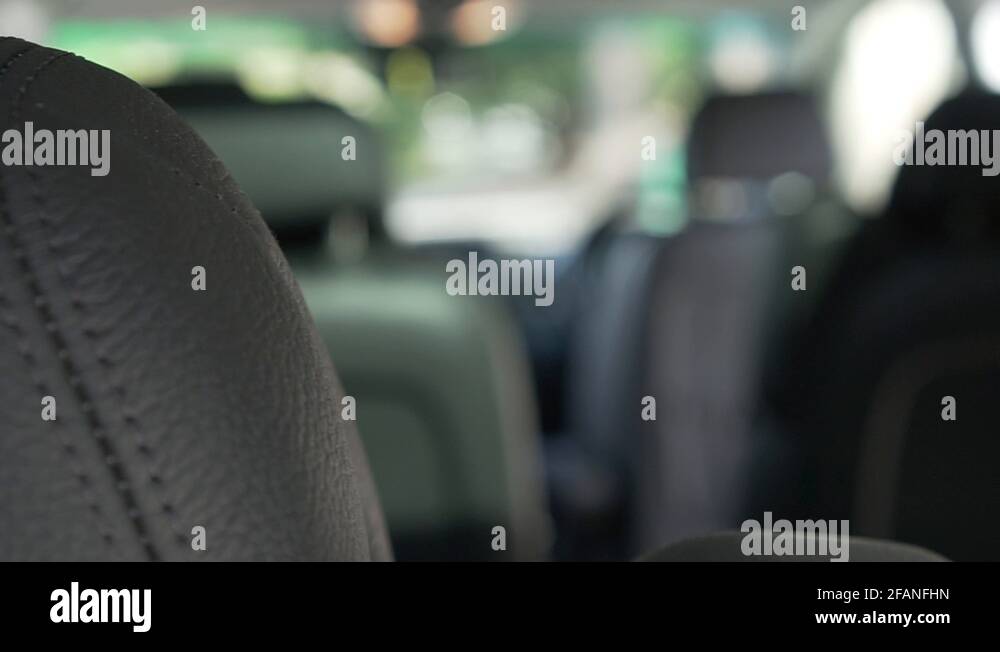 SLOWMO - Interior of luxury minivan black leather seats and cockpit ...