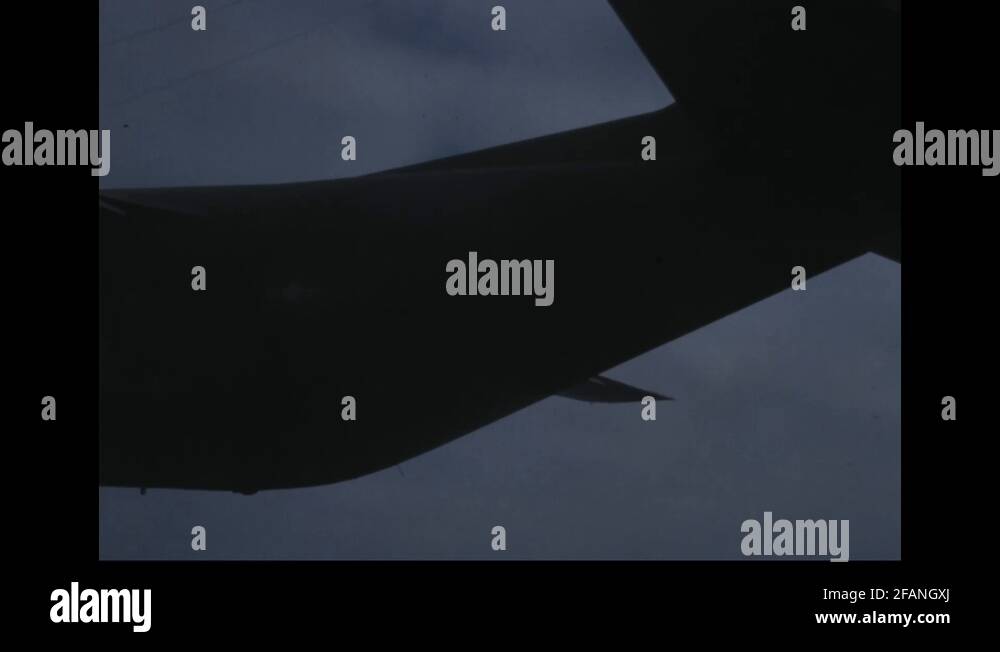 Camouflaged Lockheed AC-130 drops flares during flight testing - 1967 ...