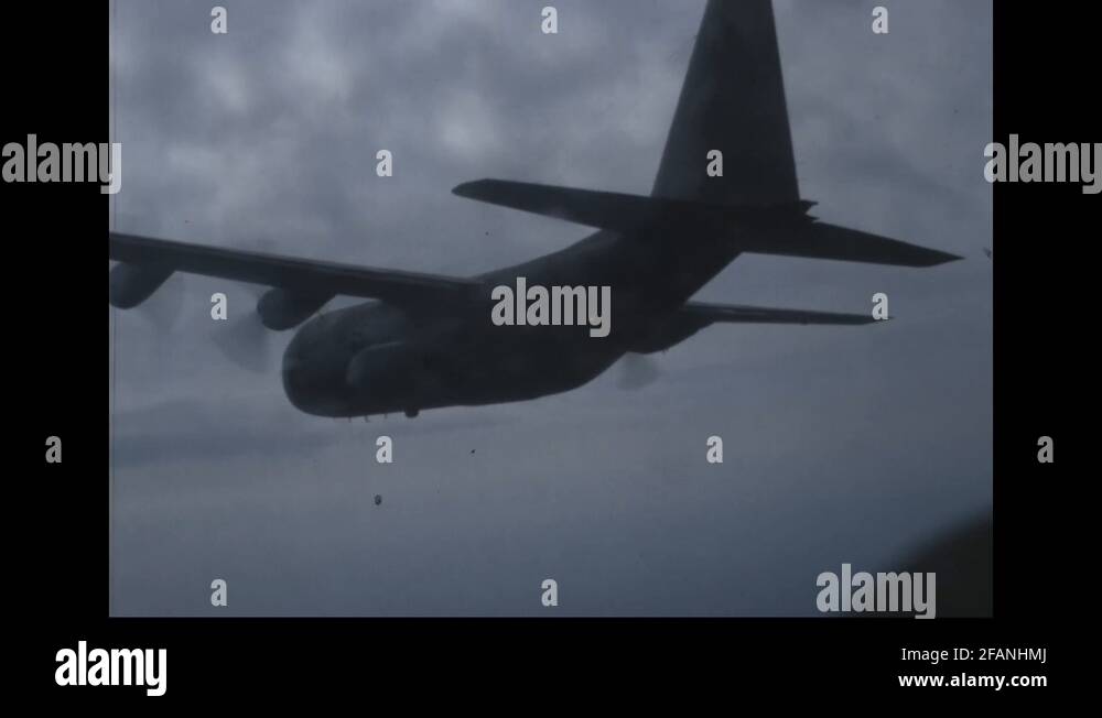 Camouflaged Lockheed AC-130 drops flares during flight testing - 1967 ...