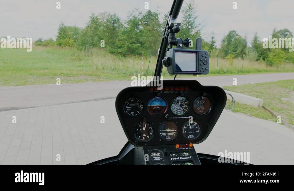 Robinson R44 instrument panel and control joystick during take-off and ...
