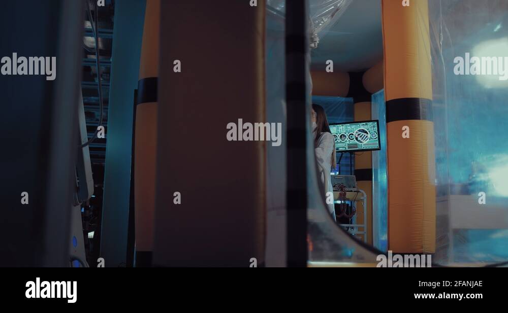 Alien lies on the operating table in the laboratory, connected to a ...