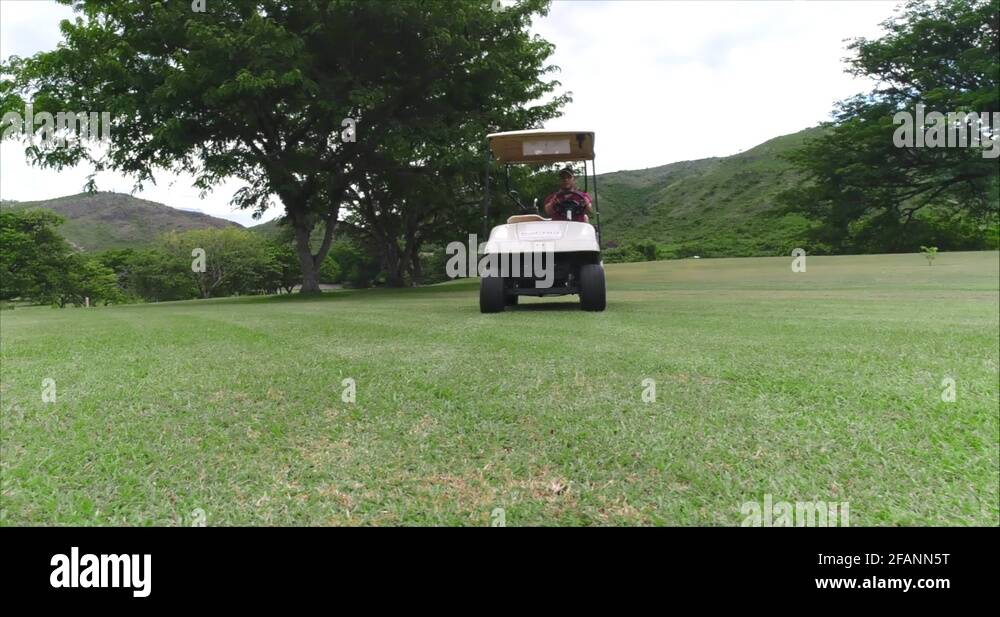 Man driving golf cart Stock Videos & Footage - HD and 4K Video Clips ...