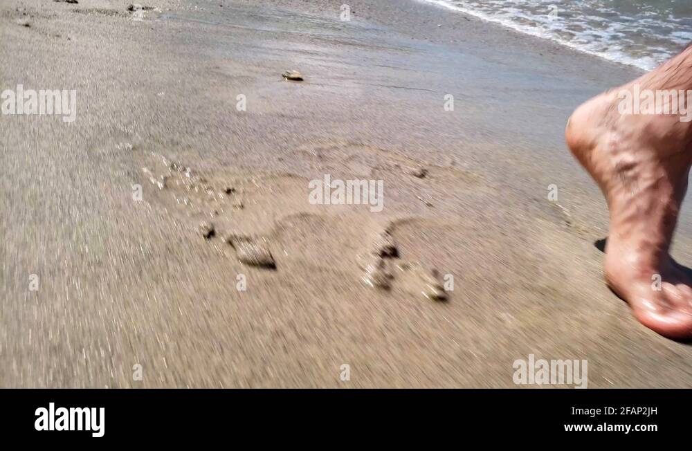 Foot steps on beach Stock Videos & Footage - HD and 4K Video Clips - Alamy