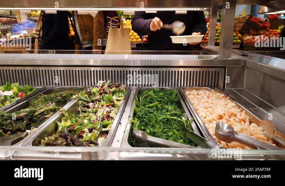 Cold salad buffet at Whole Foods Market in Piccadilly Circus, London ...