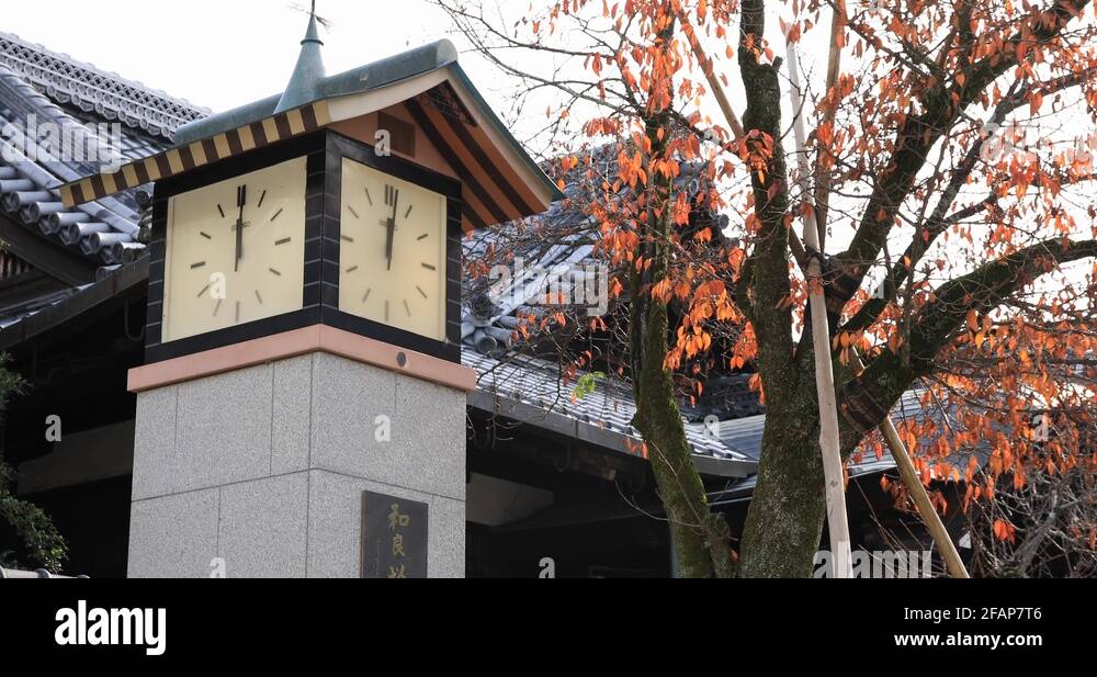 Old fashioned clock tower at Japanese shrine Stock Video Footage - Alamy