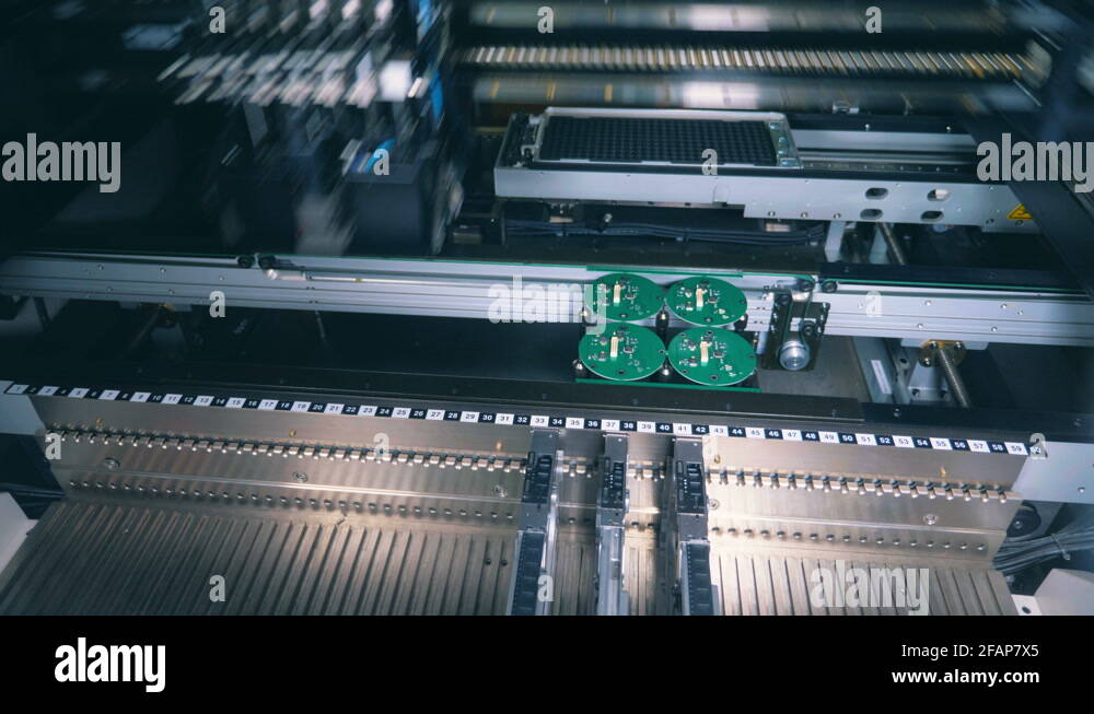 Assembling machine works with motherboards, close up Stock Video ...