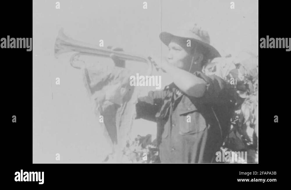 Viet cong blow bugle, charge across field, firing M-16 rifle - 1967 ...