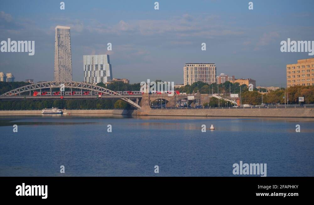Moscow/Russia - 30 August 2018: A passenger train crossing an iron ...