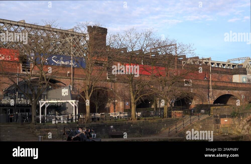 Manchester city centre trams and trains on bridge UK England 4K Stock ...