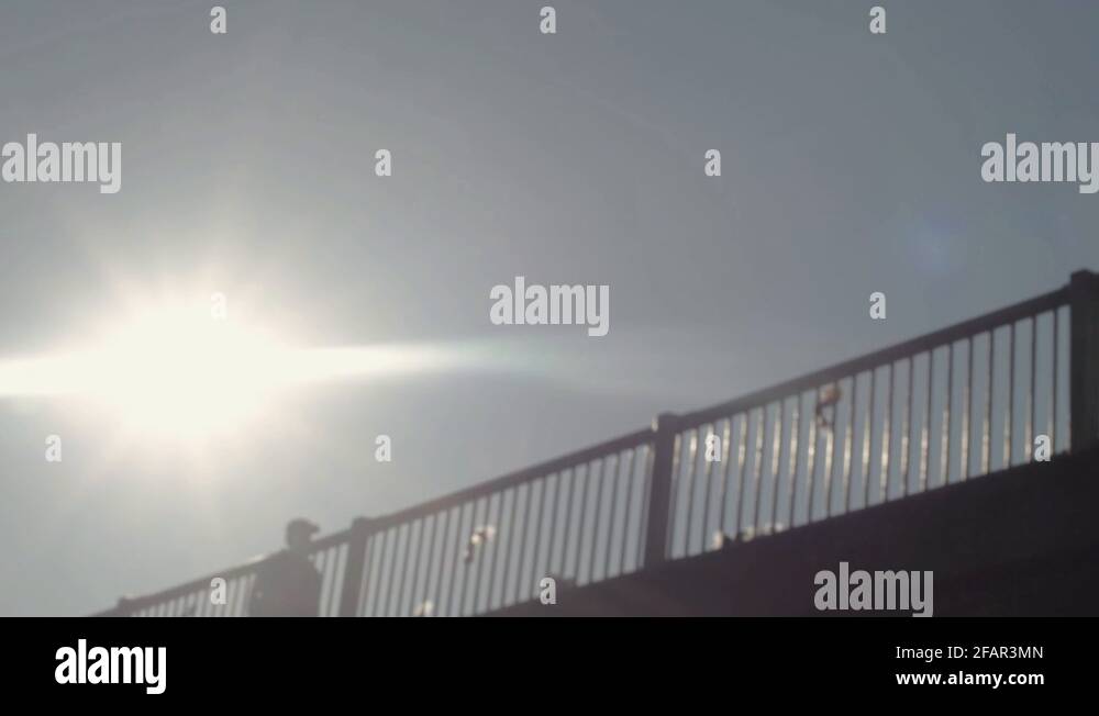 Man crossing a bridge Stock Videos & Footage - HD and 4K Video Clips ...
