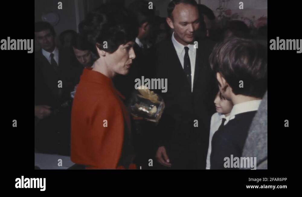 Astronaut Michael Collins and his wife talk to delegates and kid - 1969 ...