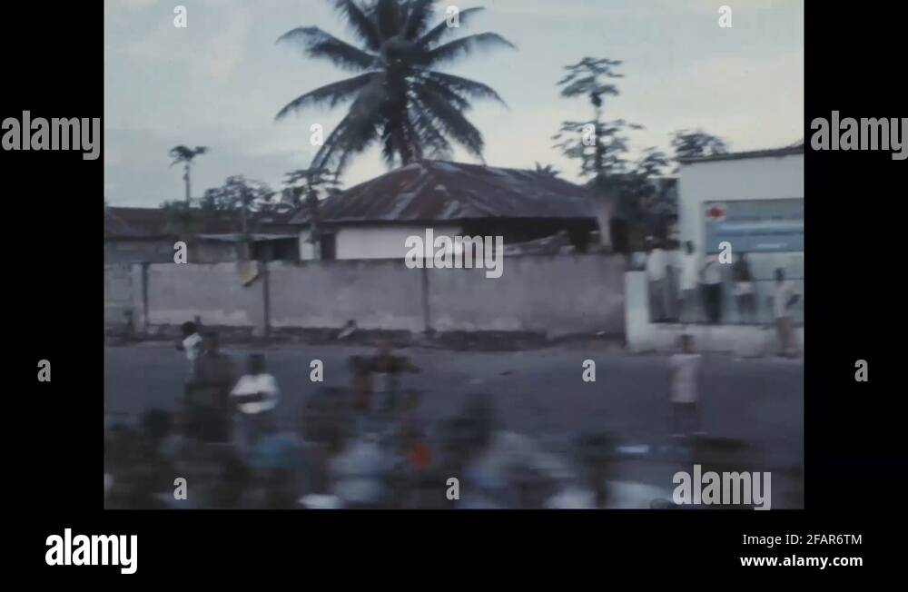 Crowd of people cheer on street during the arrival of Apollo 11 ...