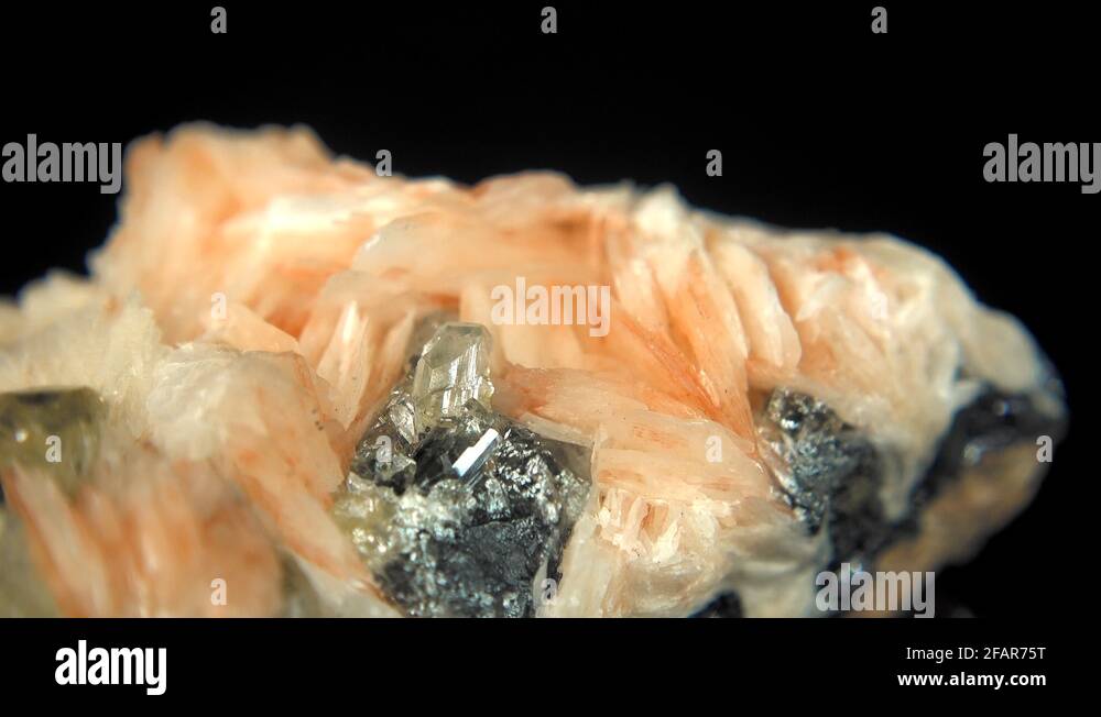 Seamlessly rotating a mineral (Pink Baryte) in front of black ...