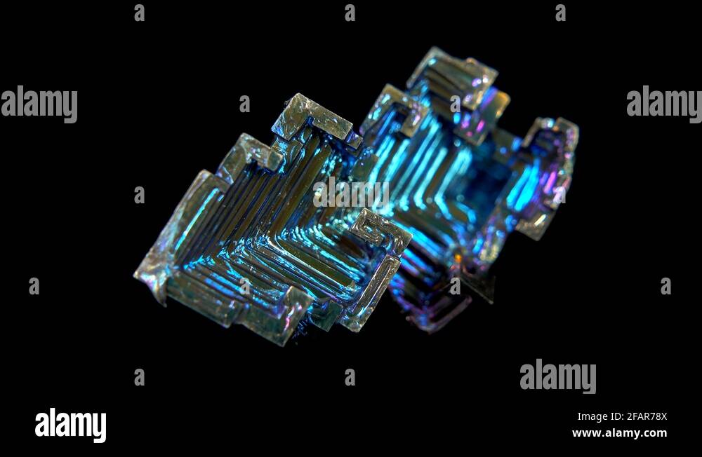 Seamlessly rotating a colorful mineral (Bismuth) in front of black ...