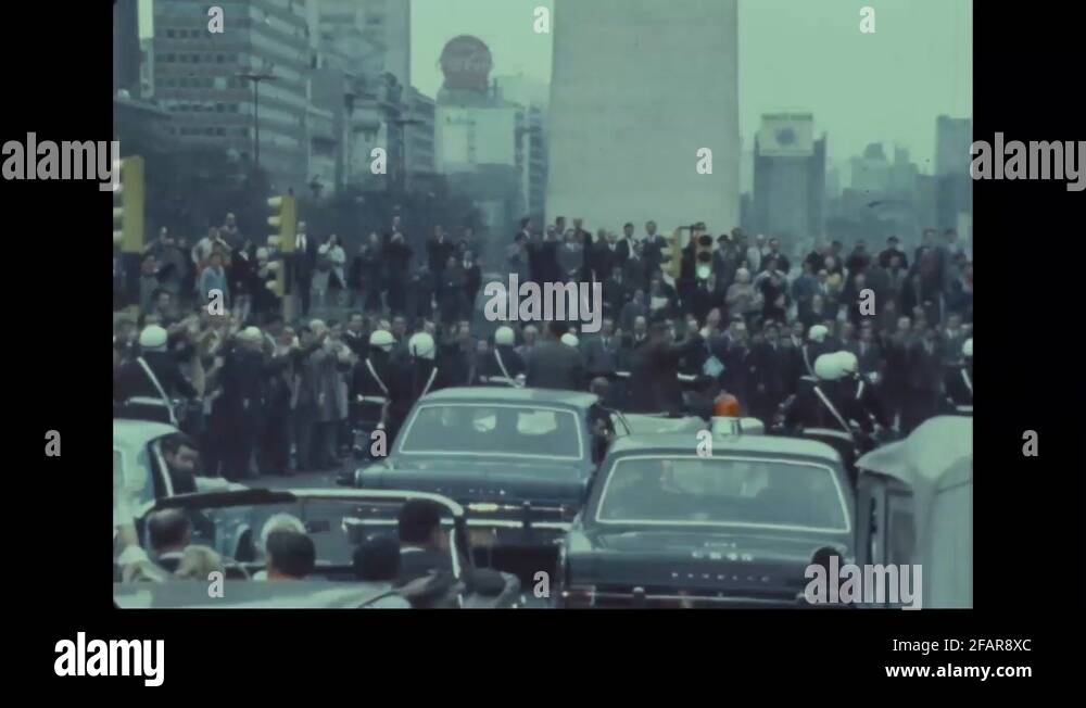 Crowd of people cheer on street on the arrival of Apollo 11 crews ...