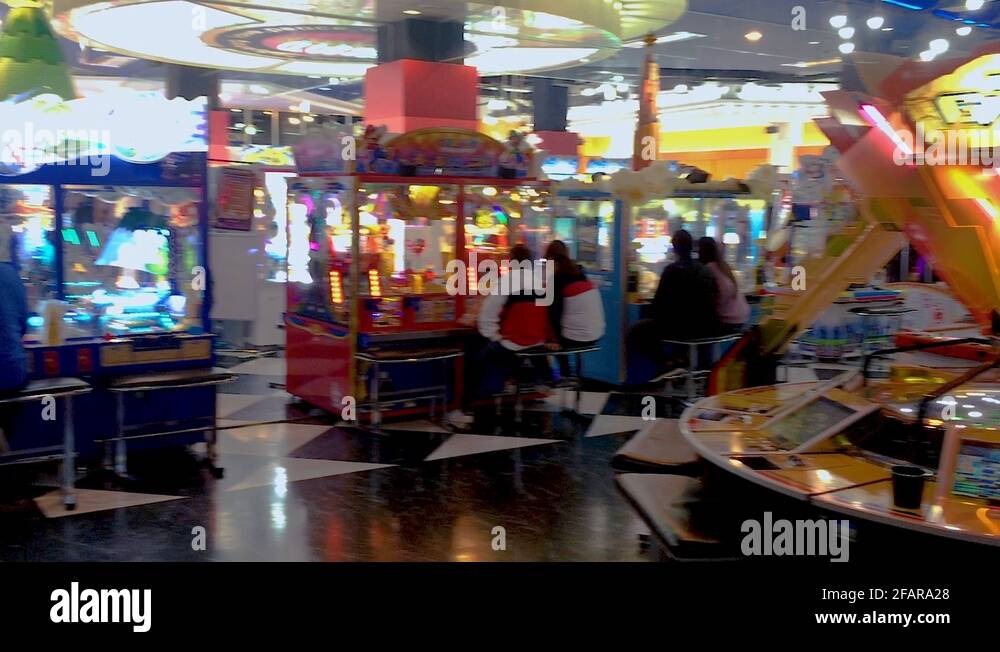 People playing video games at an arcade Stock Videos & Footage - HD and ...