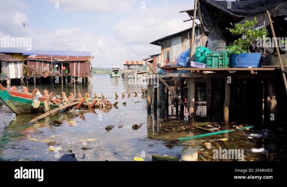 Pan view of plastic pollution in a floating village in Cambodia Stock ...