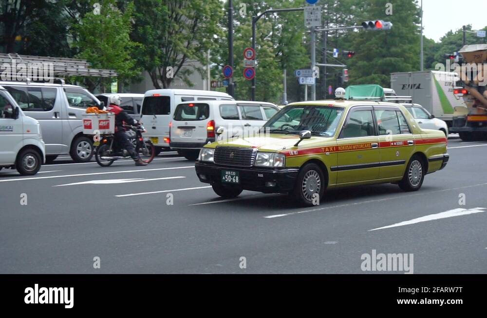 3 Different Color Taxi Cabs Driving in Tokyo, Japan Stock Video Footage ...