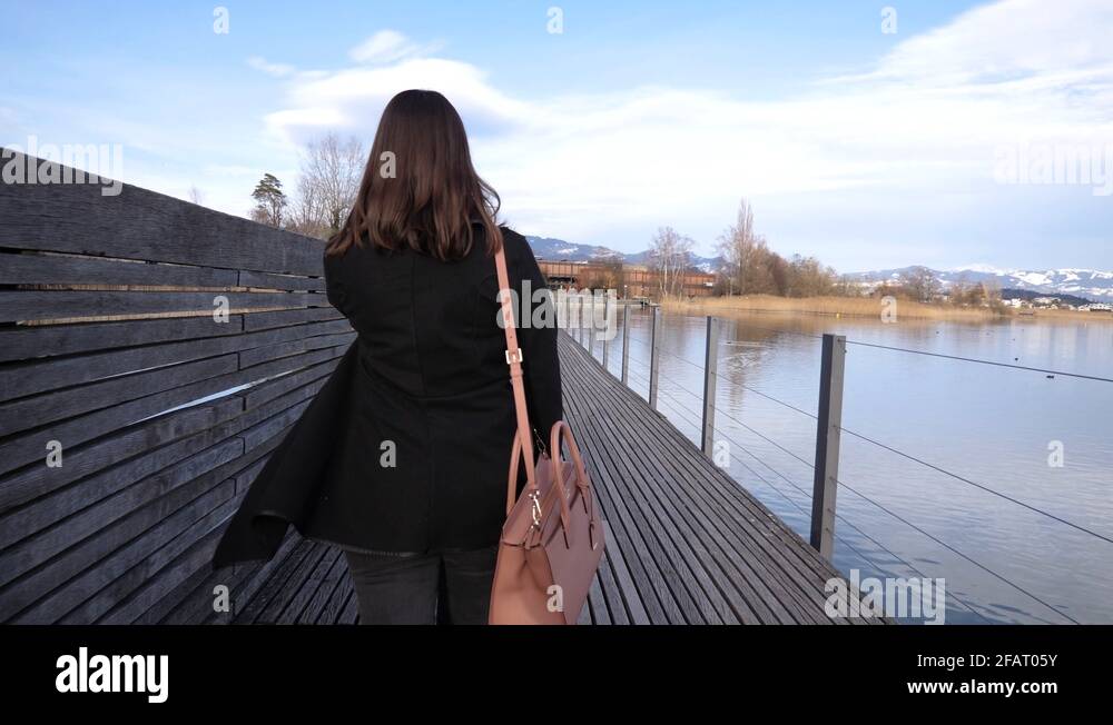 Woman walking looking back Stock Videos & Footage - HD and 4K Video ...