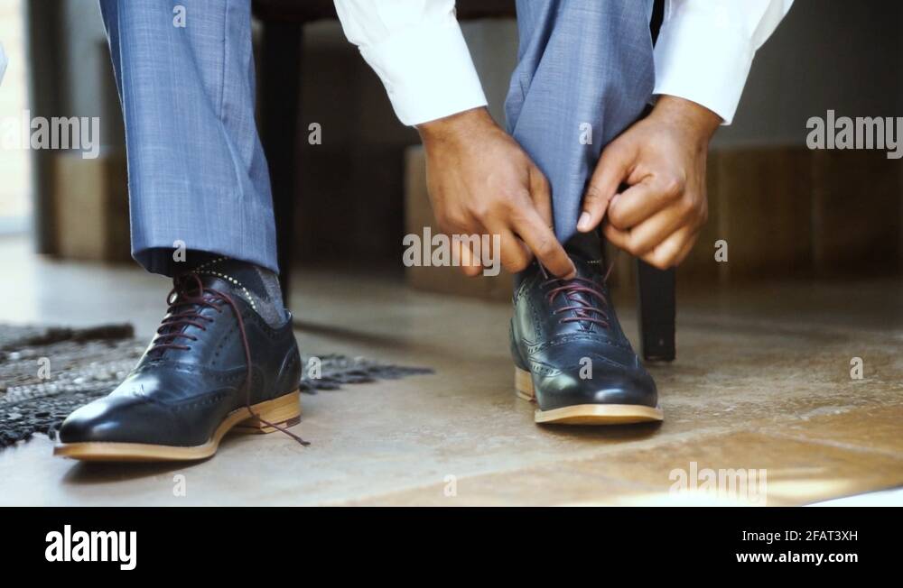 Groom putting on wedding shoes Stock Videos & Footage - HD and 4K Video ...