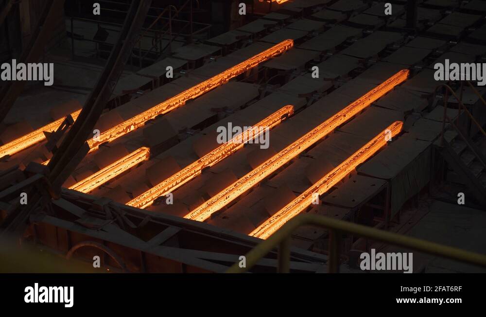 Steelmaking, steel bars and pipe production, red-hot pipes transported ...