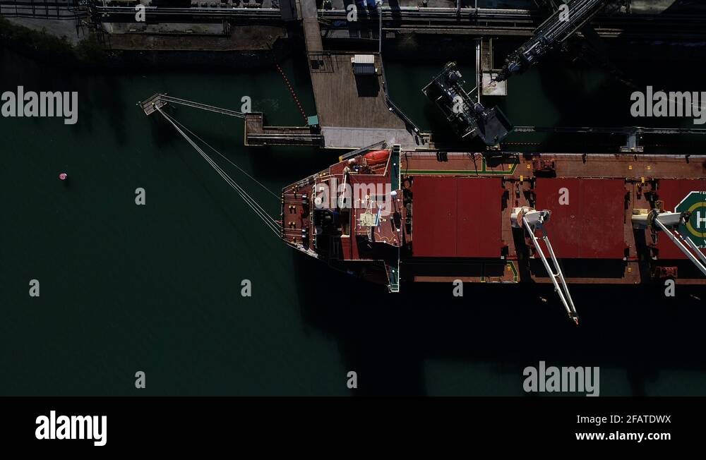 Overhead Aerial Footage Over Tanker Shipyard And Water Top Down Stock ...