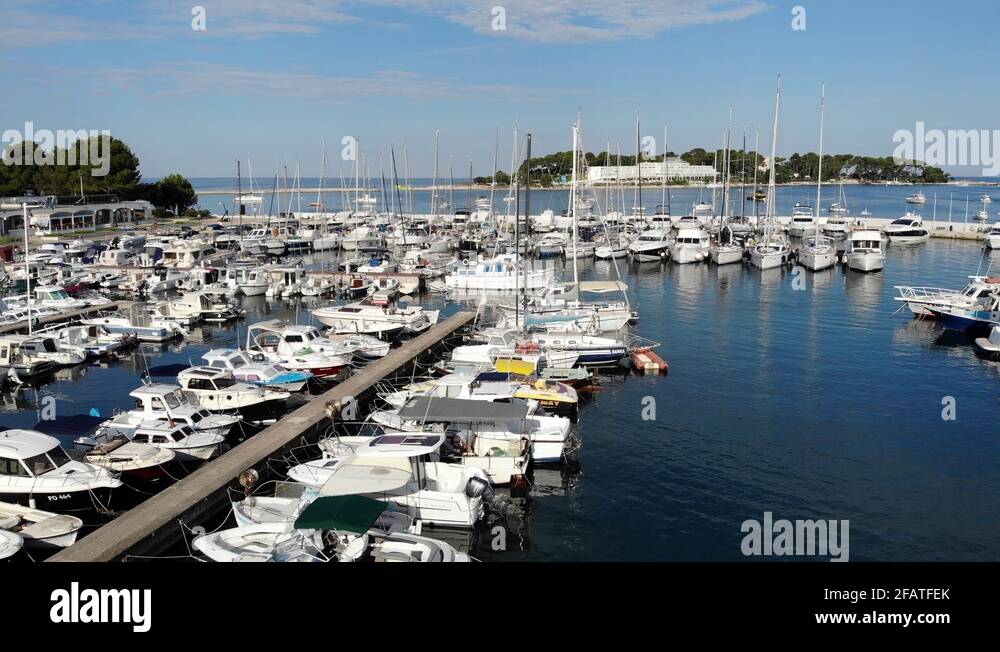 Porec harbor side view with Sveti Nikola Stock Video Footage - Alamy