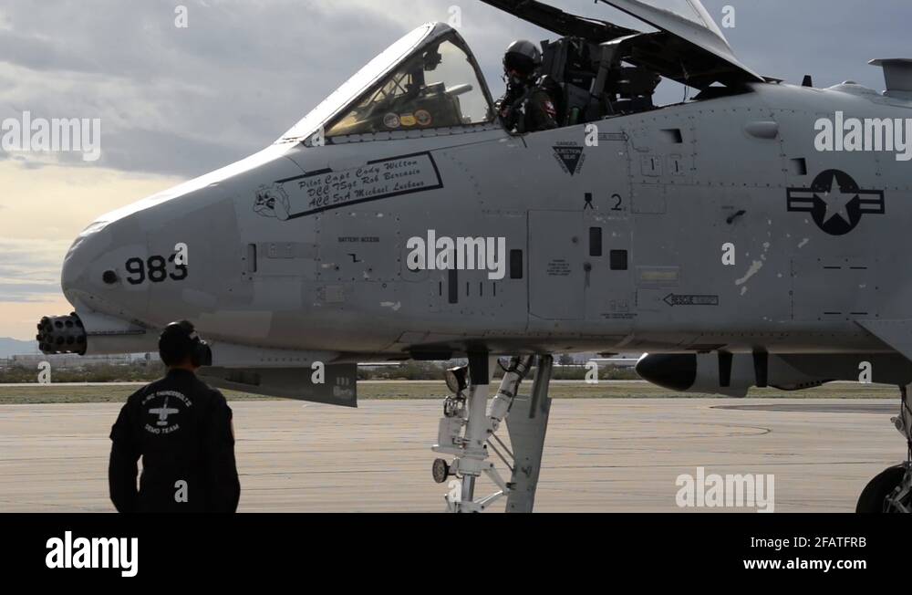 A-10 Thunderbolt demo team marshaller signalling to pilot for pre ...
