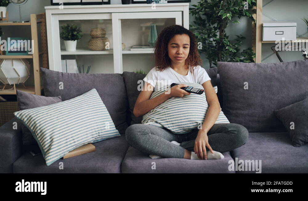 Zoom-in of attractive African-American woman crying after sad drama on ...