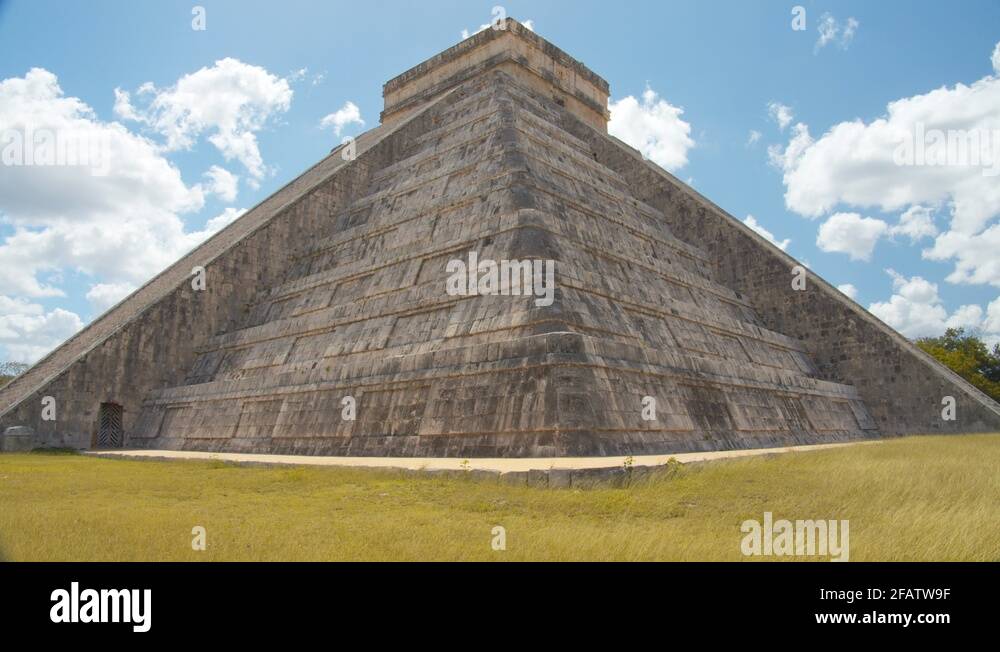 El Castillo pyramid at Chichen Itza with blue sky and clouds - no ...