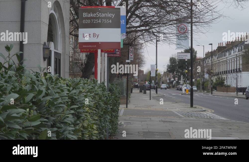 Row of estate agent boards Stock Videos & Footage - HD and 4K Video ...