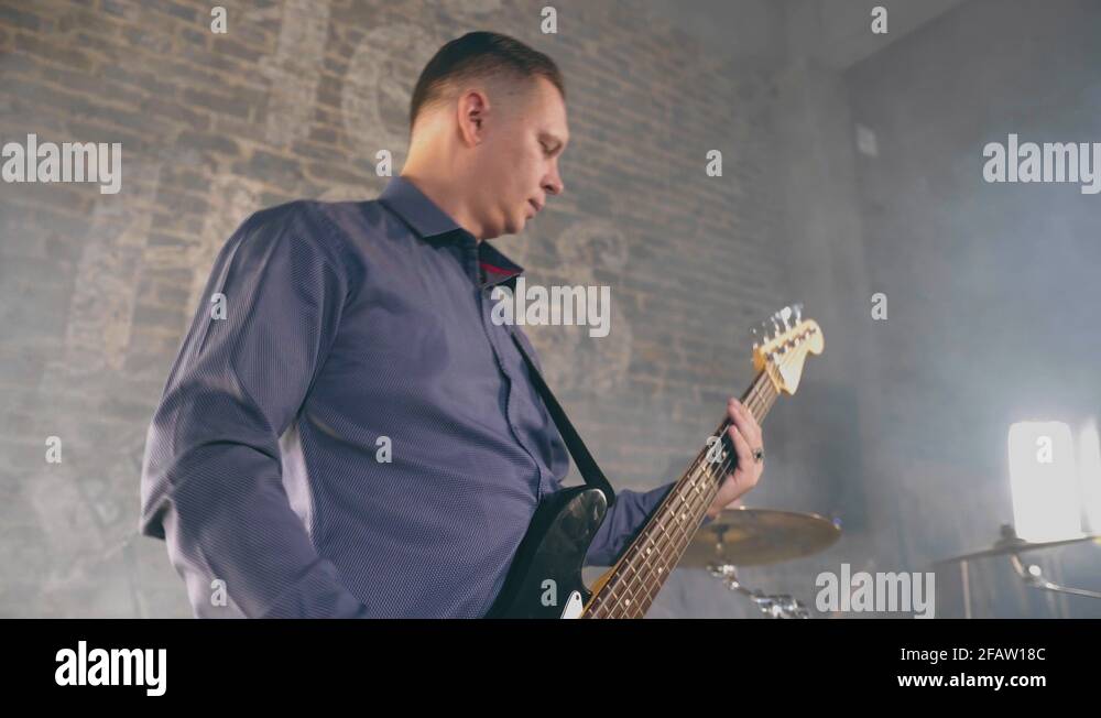 Rock band playing instruments Stock Videos & Footage - HD and 4K Video ...