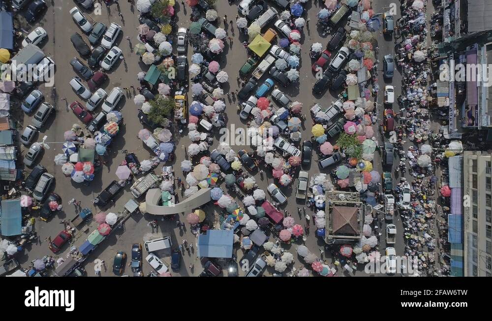 Crowd of people and cars at Makola market, Accra Ghana Stock Video ...
