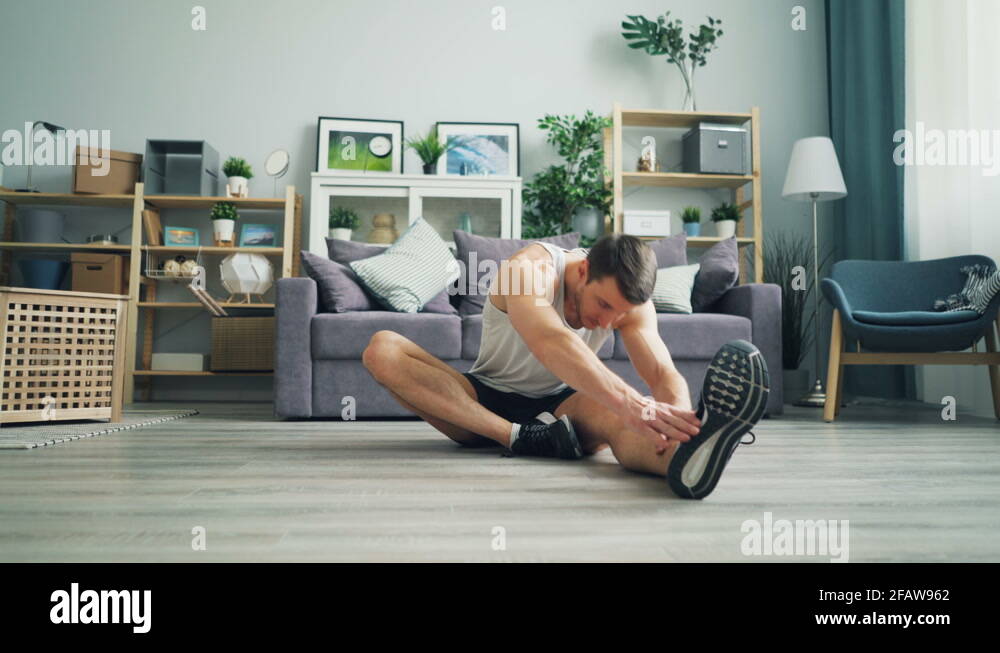 One leg forward bend Stock Videos & Footage - HD and 4K Video Clips - Alamy