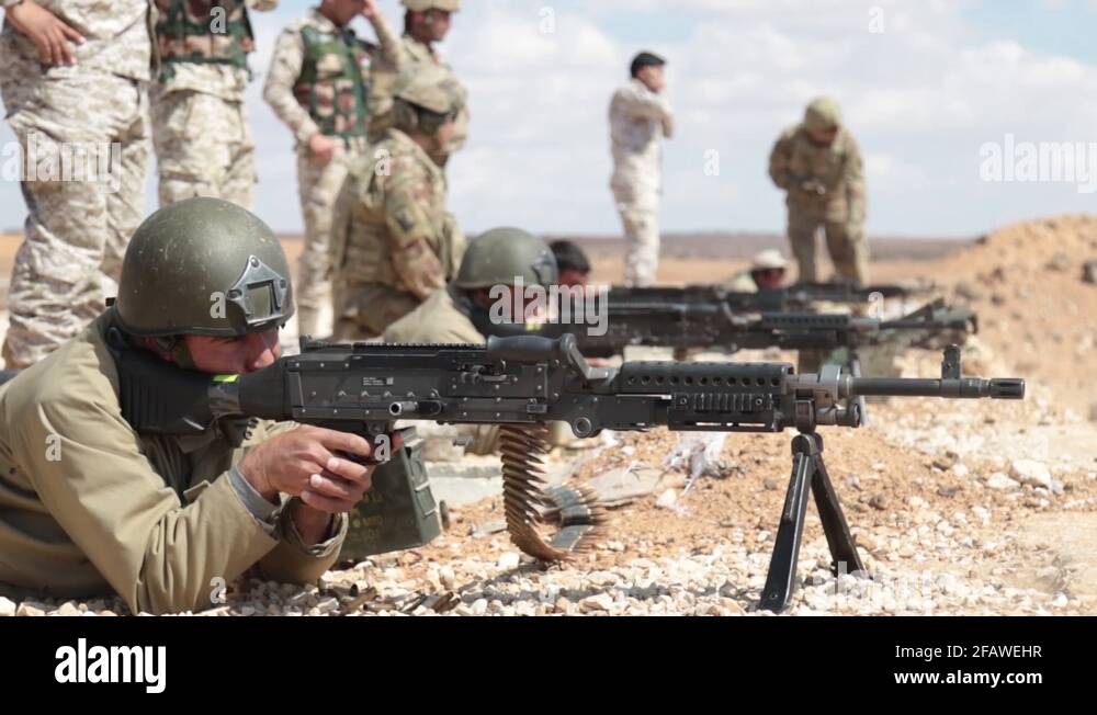 Jordanian Armed Forces soldier firing machine gun Stock Video Footage ...