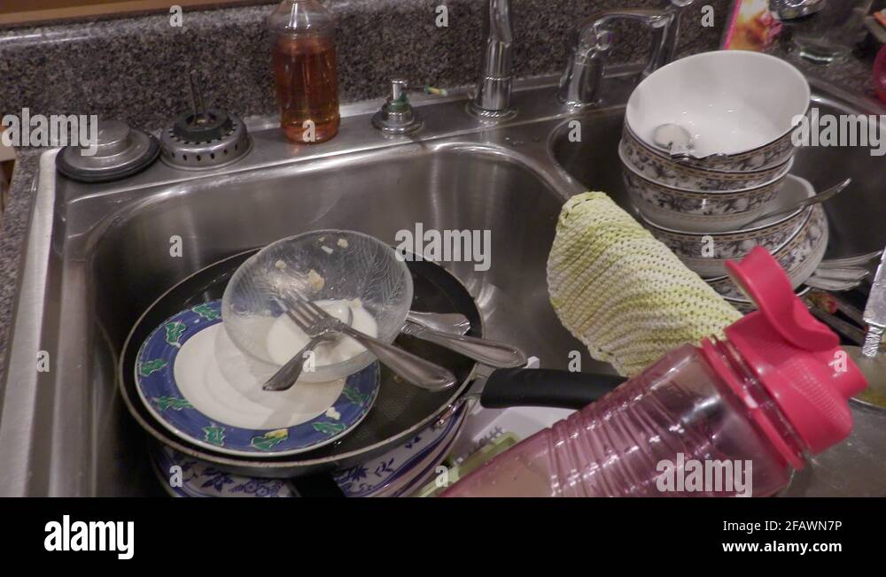 Stack dirty dishes in sink Stock Videos & Footage - HD and 4K Video ...