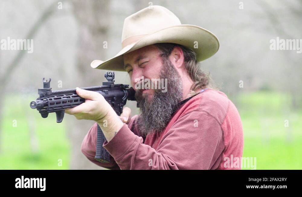 Cowboy shooting a rifle Stock Videos & Footage - HD and 4K Video Clips ...
