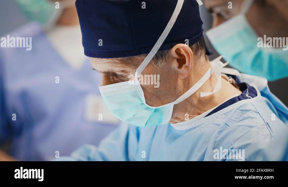 Conversation between two male surgeons during an operation Stock Video ...