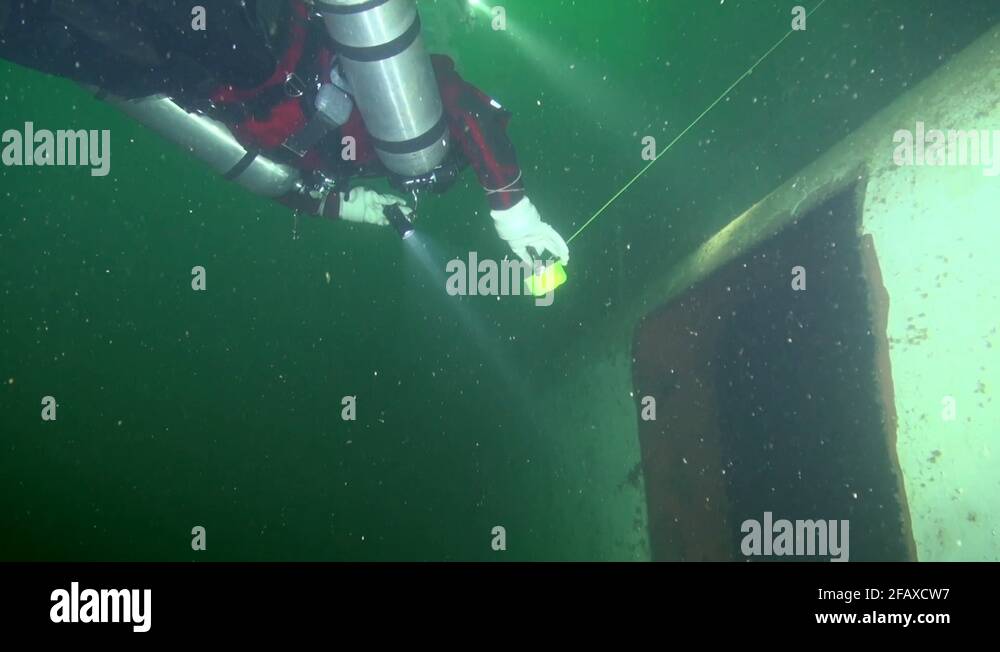 Sidemount diver enters wreck of HMCS Annapolis with a line Stock Video ...