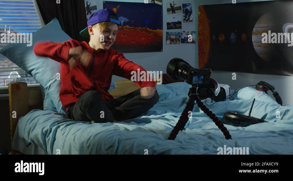 Boy recording vlog video at home Stock Video Footage - Alamy