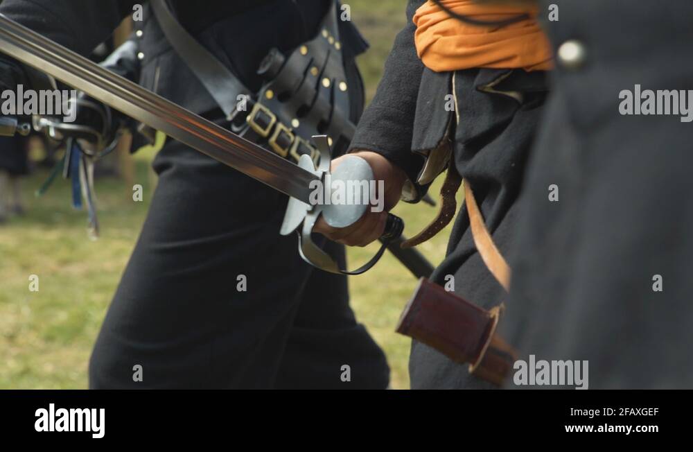 Holding swords Stock Videos & Footage - HD and 4K Video Clips - Alamy
