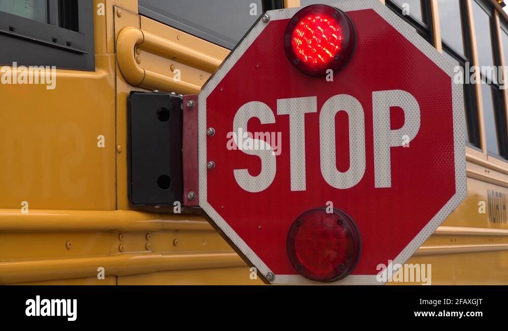 School bus stopped and sign out Stock Video Footage - Alamy