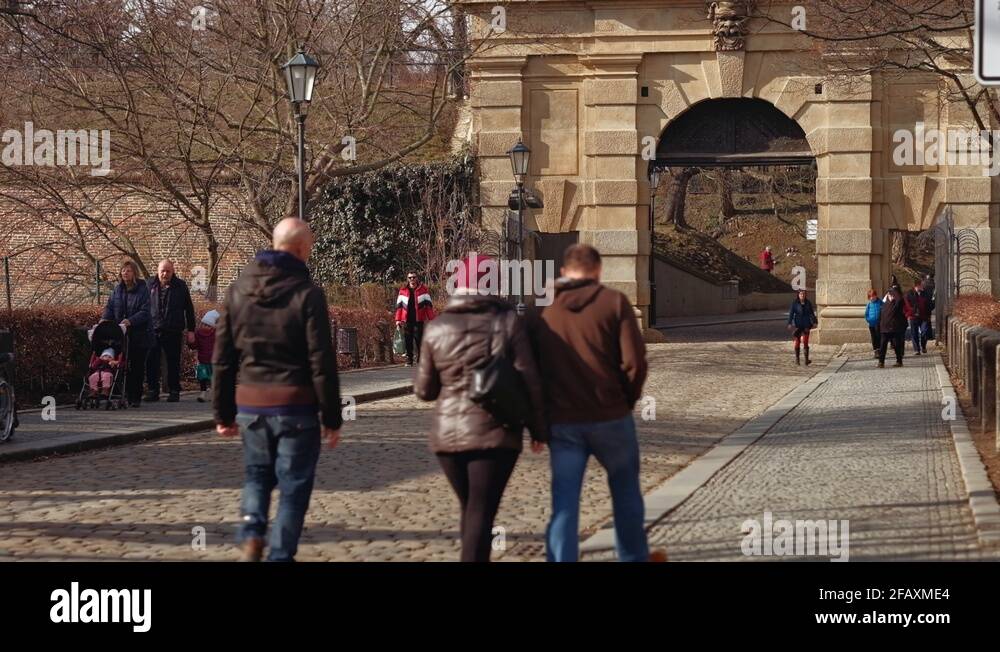Prague - People walking in front of entrance gate at Vysehrad historic ...
