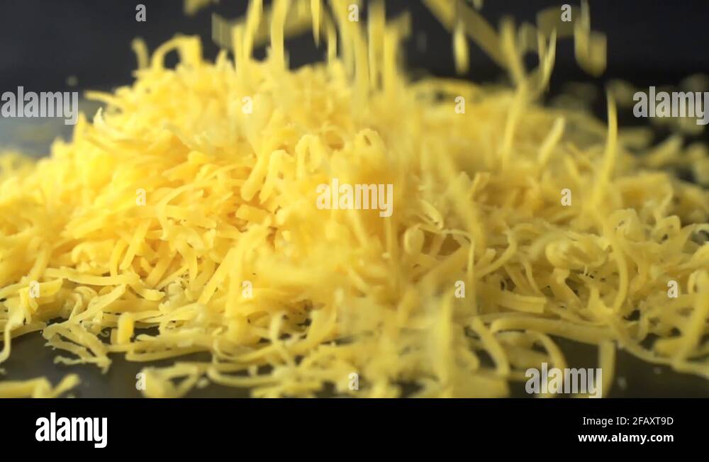 Pile grated cheddar cheese cheddar cheese block Stock Videos & Footage ...