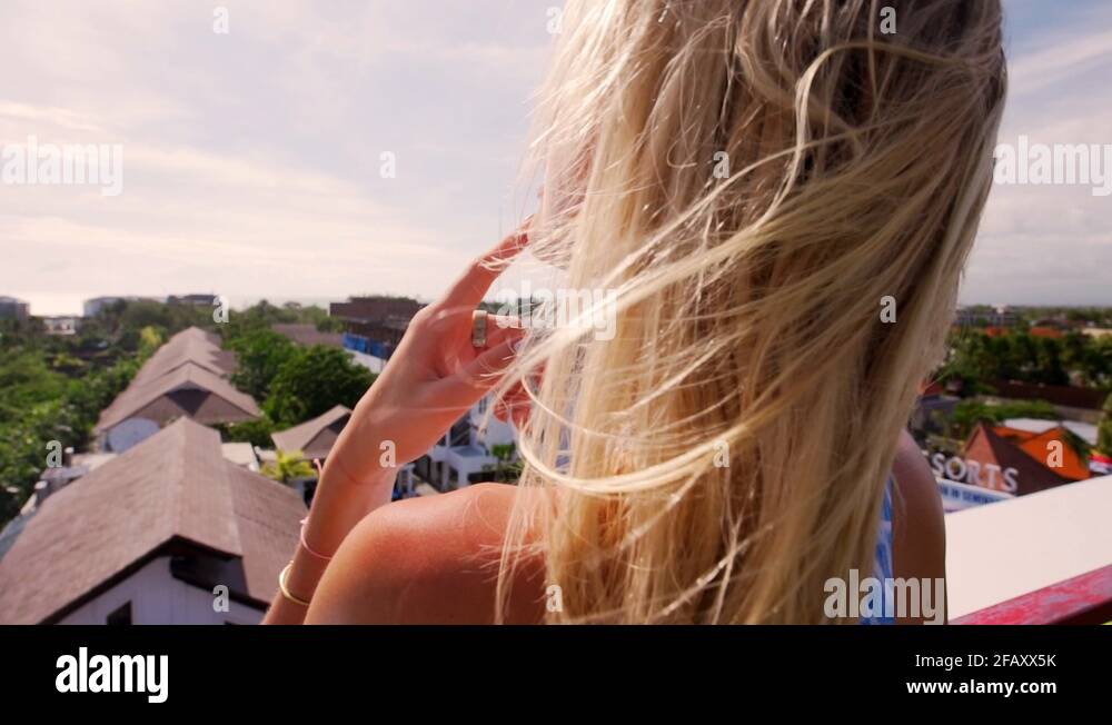 Slow motion: Bikini model at a tropical beach at Seminyak, Bali Stock ...
