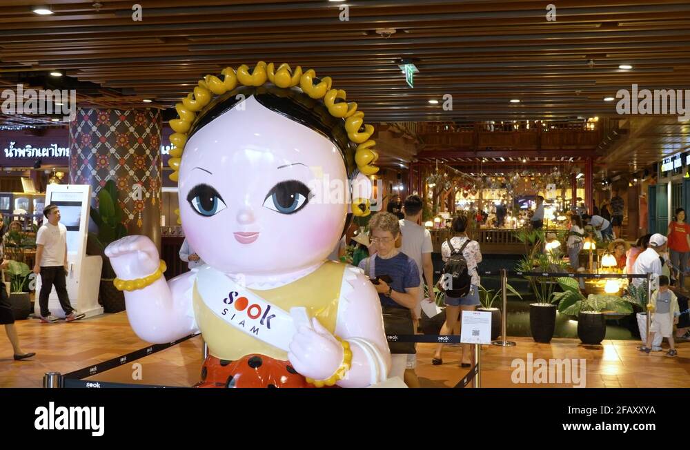 Sliding shot of the Sook Siam statue at Icon Siam Mega Shopping Mall ...