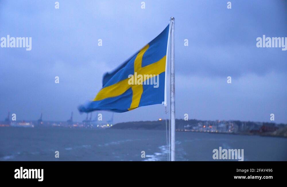 Real swedish flag at the back of ship. Harsh weather. Real Sweden Flag ...