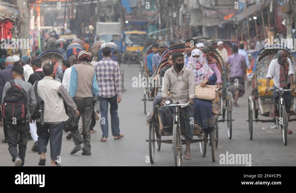 Bicycle rickshaw with muslim woman in busy street,Dhaka,Bangladesh ...